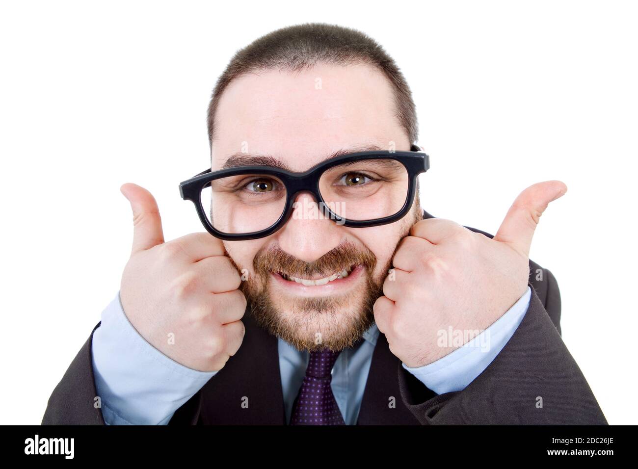 young silly business man going thumbs up Stock Photo - Alamy