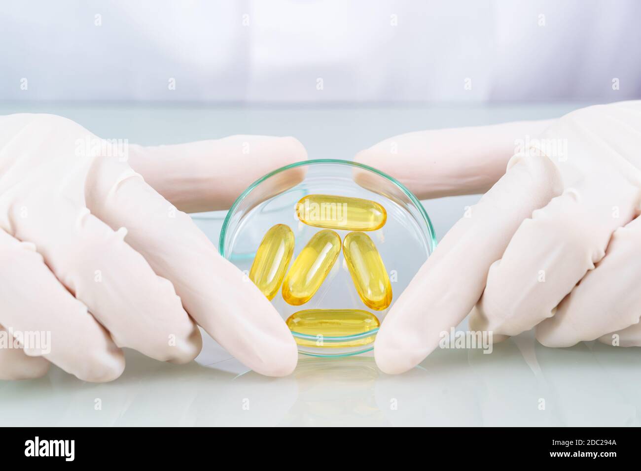 Close up Scientist hands putting in nitrile latex gloves holding Omega ...