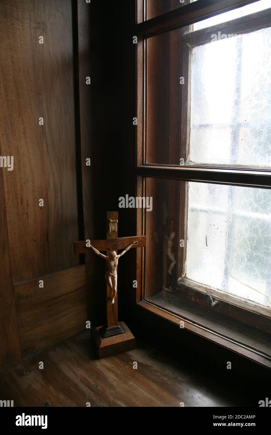 Cross at the window Stock Photo - Alamy