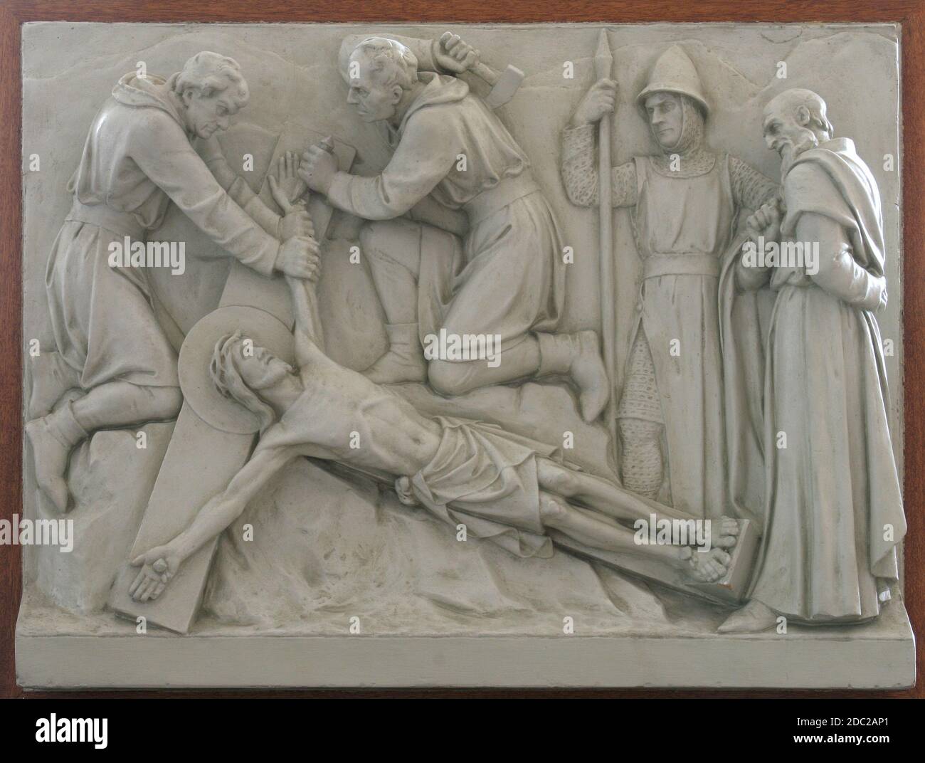 11th Station of the Cross - Crucifixion: Jesus is nailed to the cross Stock Photo - Alamy