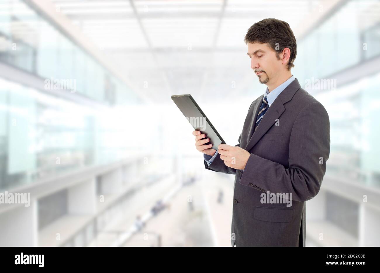 businessman using touch pad of tablet pc, at the office Stock Photo - Alamy