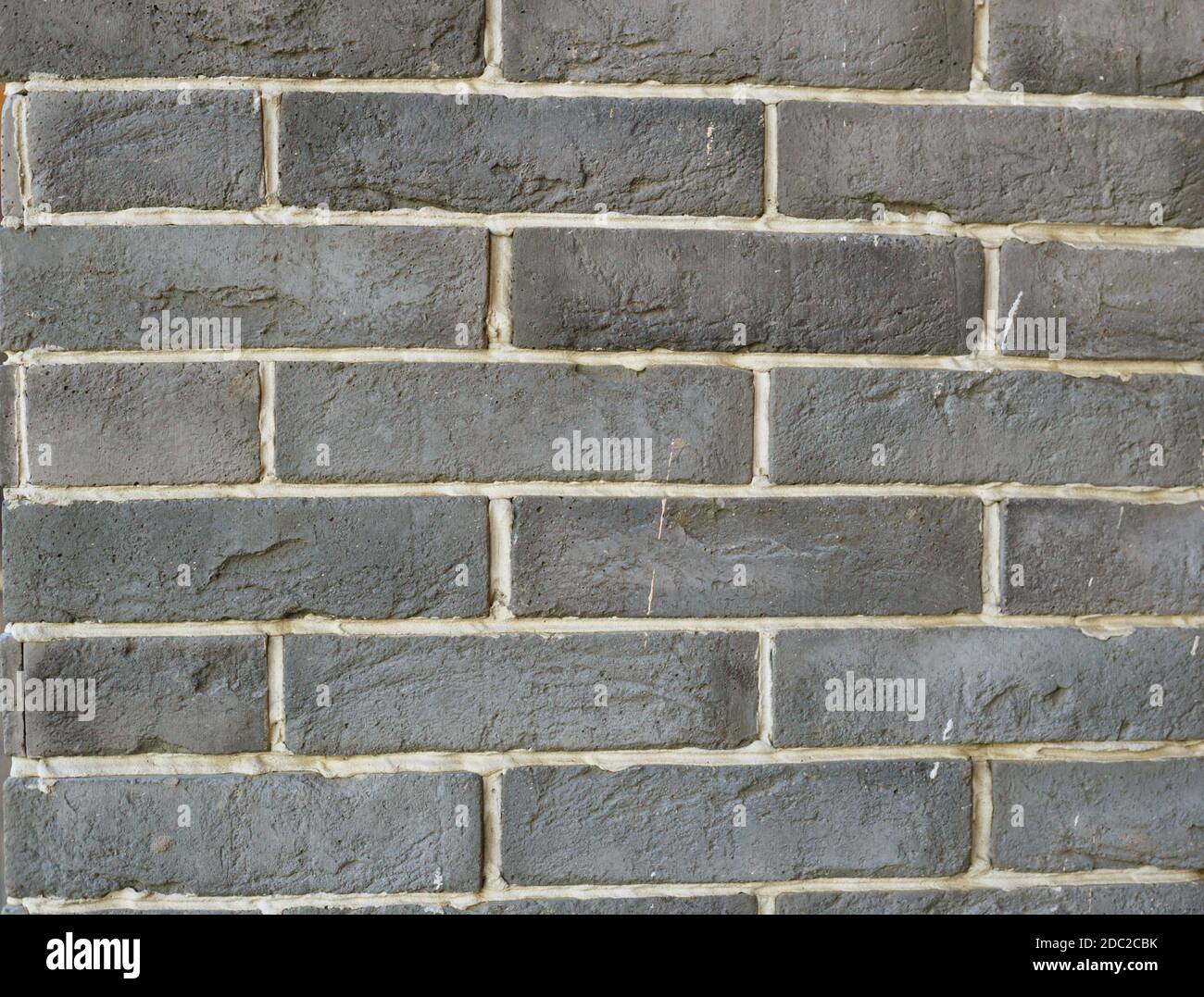 gray brick wall. great background for design Stock Photo - Alamy