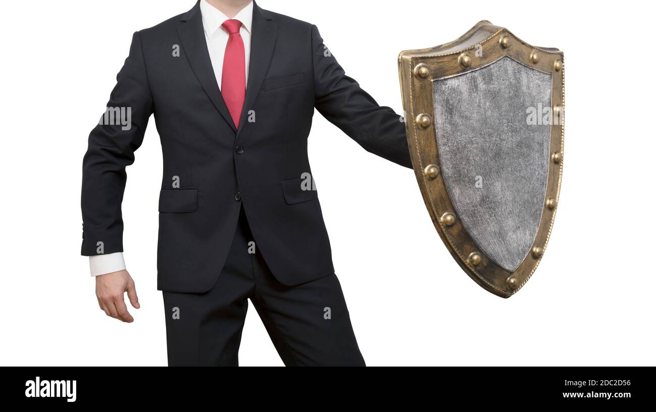 Businessman with shield isolated on white background with clipping path ...