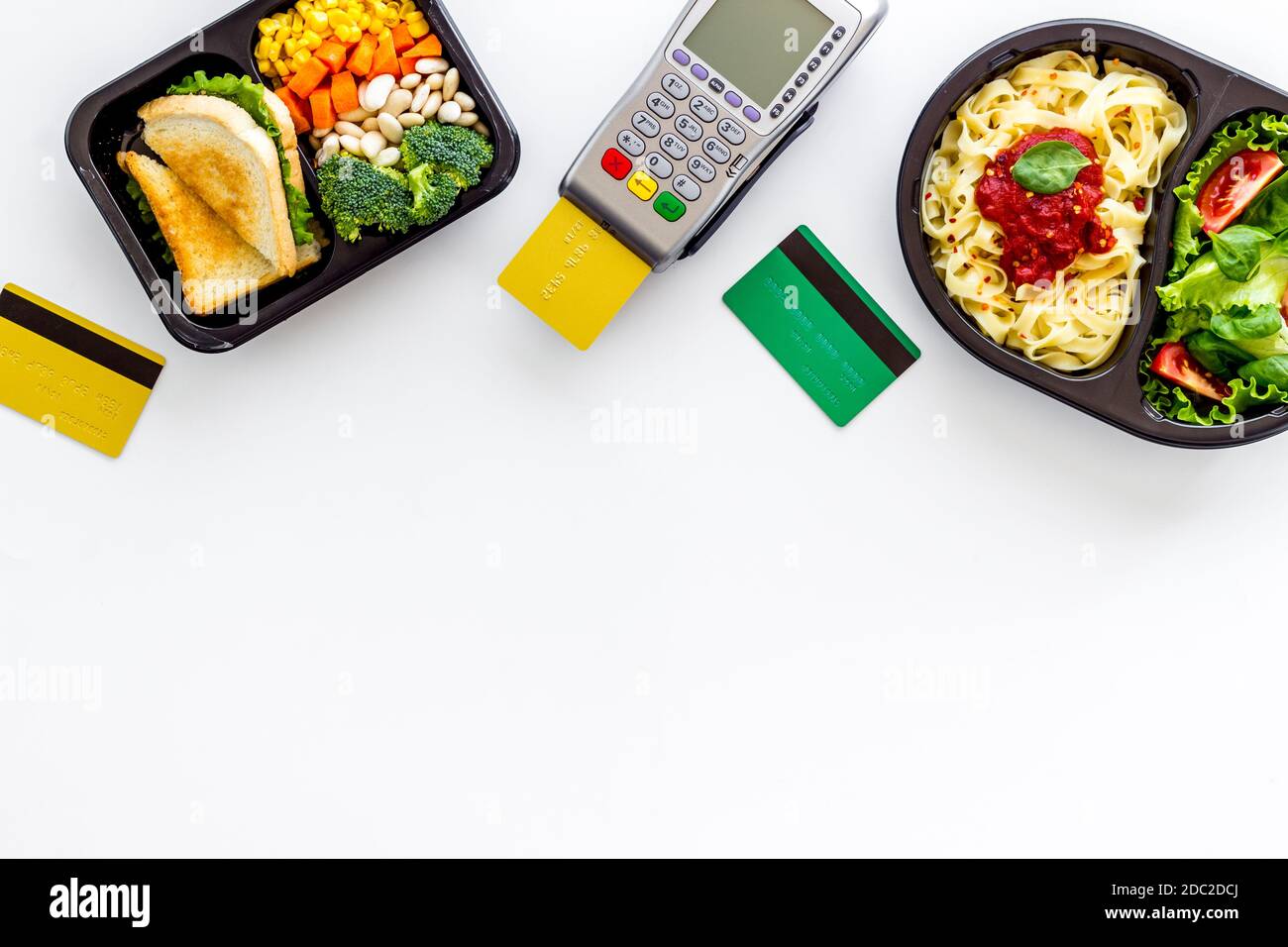 Food delivery payment with terminal and lunch boxes with meal Stock ...