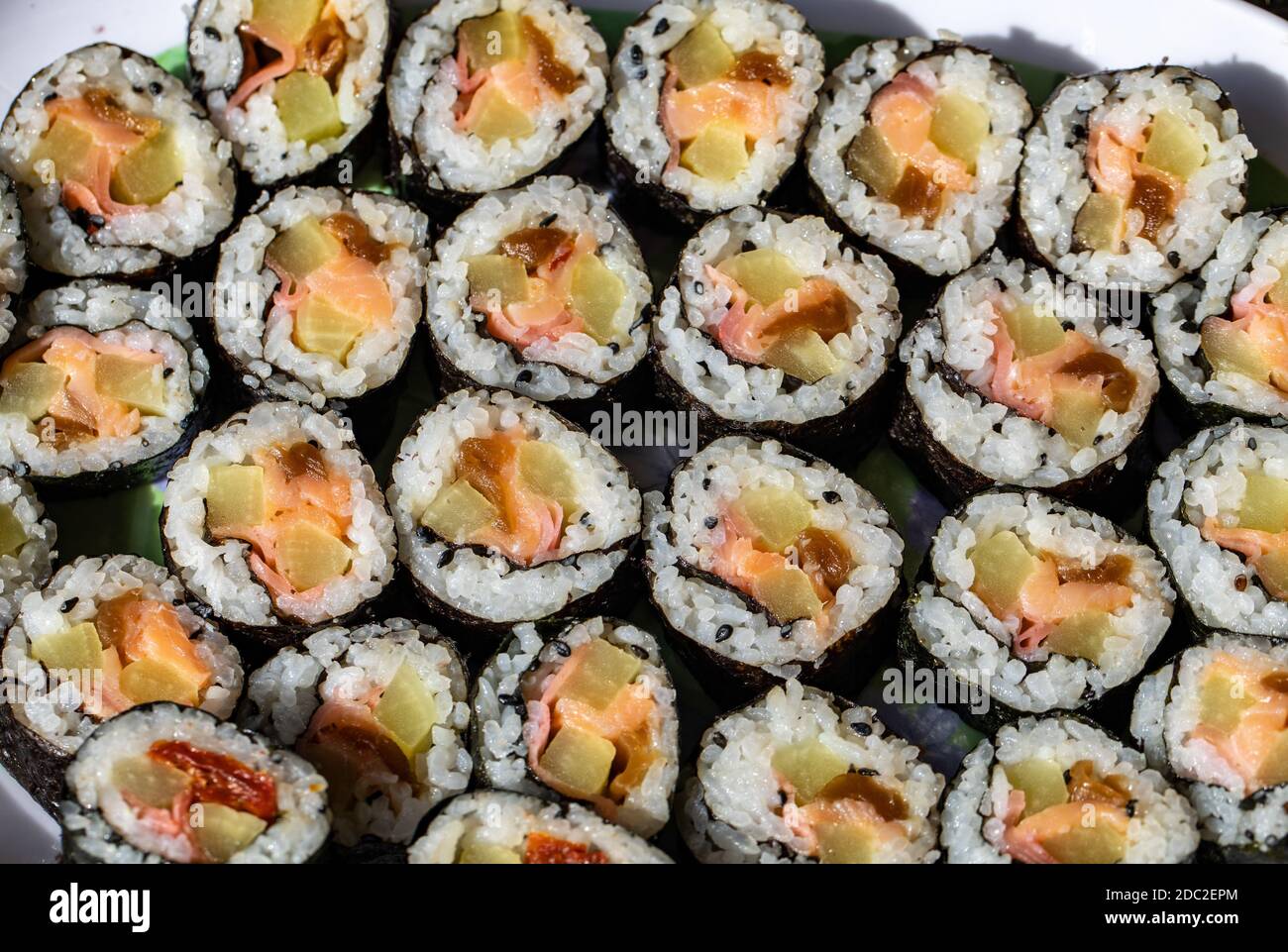 Top view of stack of Japanese sushi maki roll plate. Served in Japanese ...