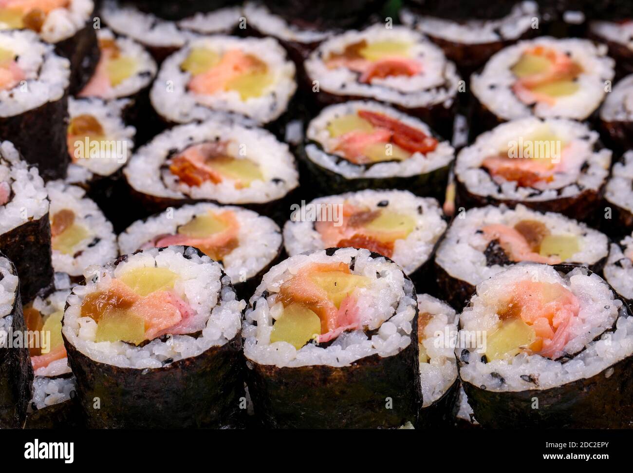 Top view of stack of Japanese sushi maki roll plate. Served in Japanese ...