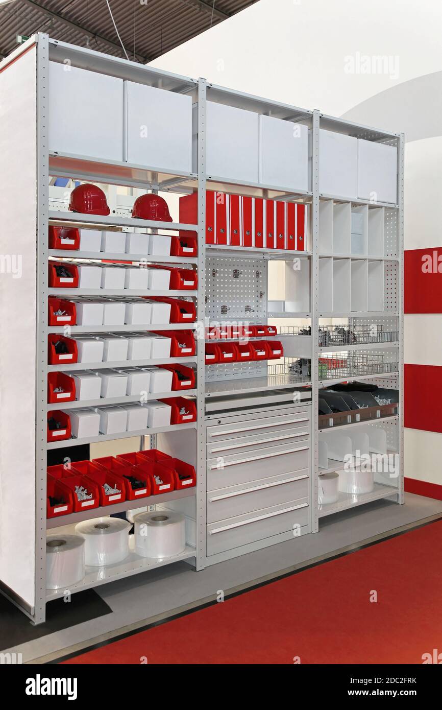 Shelving system and cabinet racks for storage organization Stock Photo ...