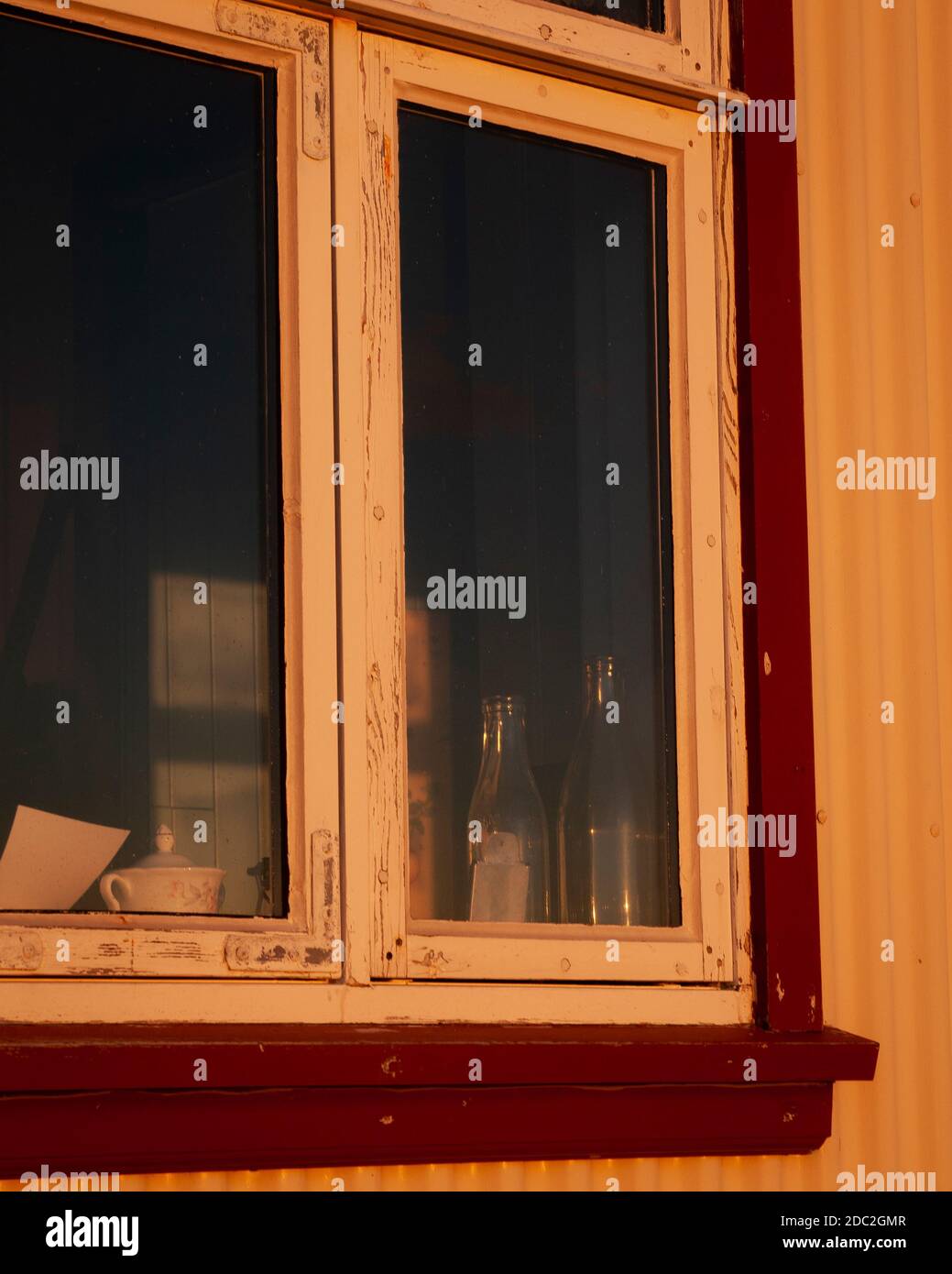 Windowview into a small house Stock Photo - Alamy