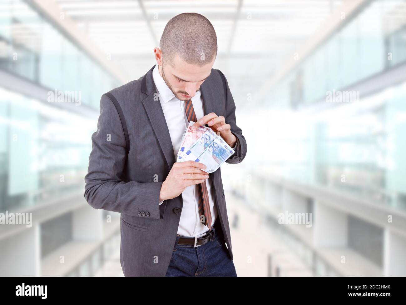 young business man with lots of money, at the office Stock Photo - Alamy