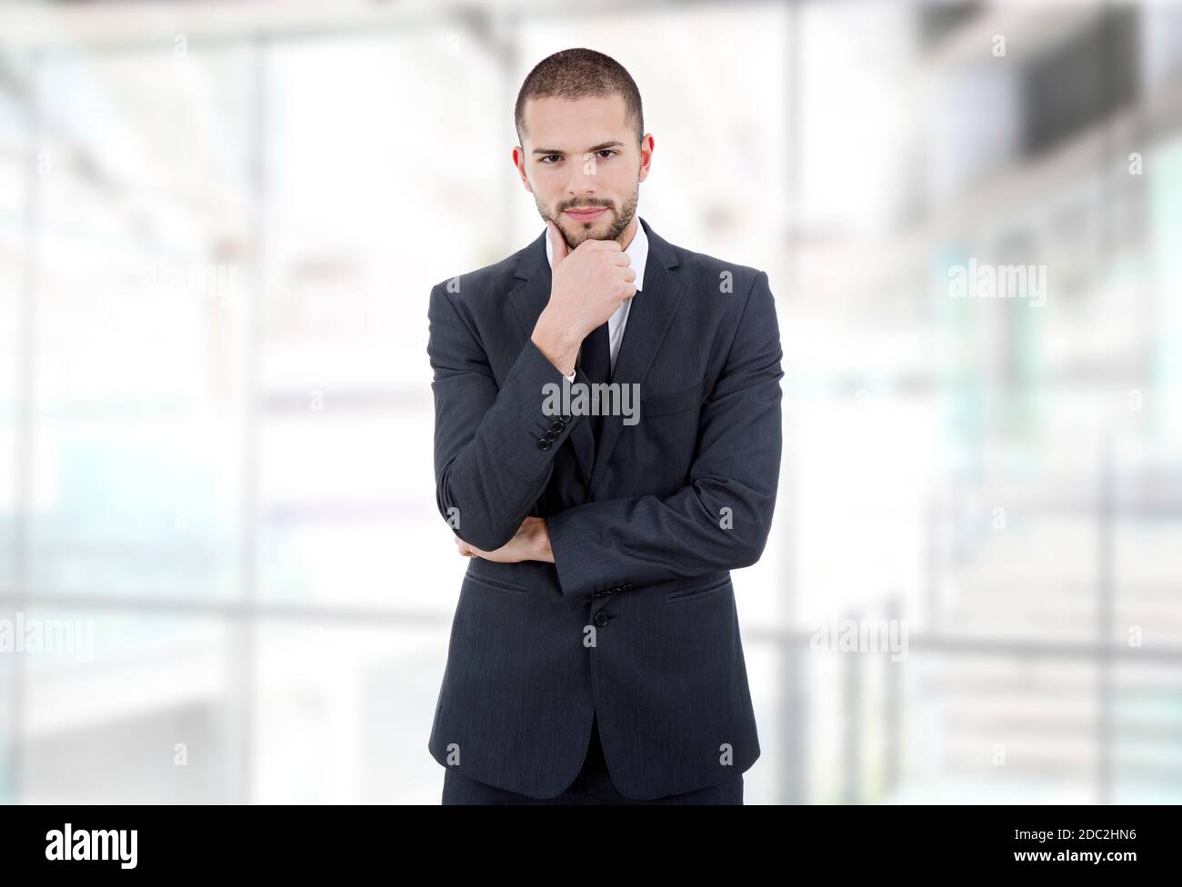 young business man thinking, at the office Stock Photo - Alamy