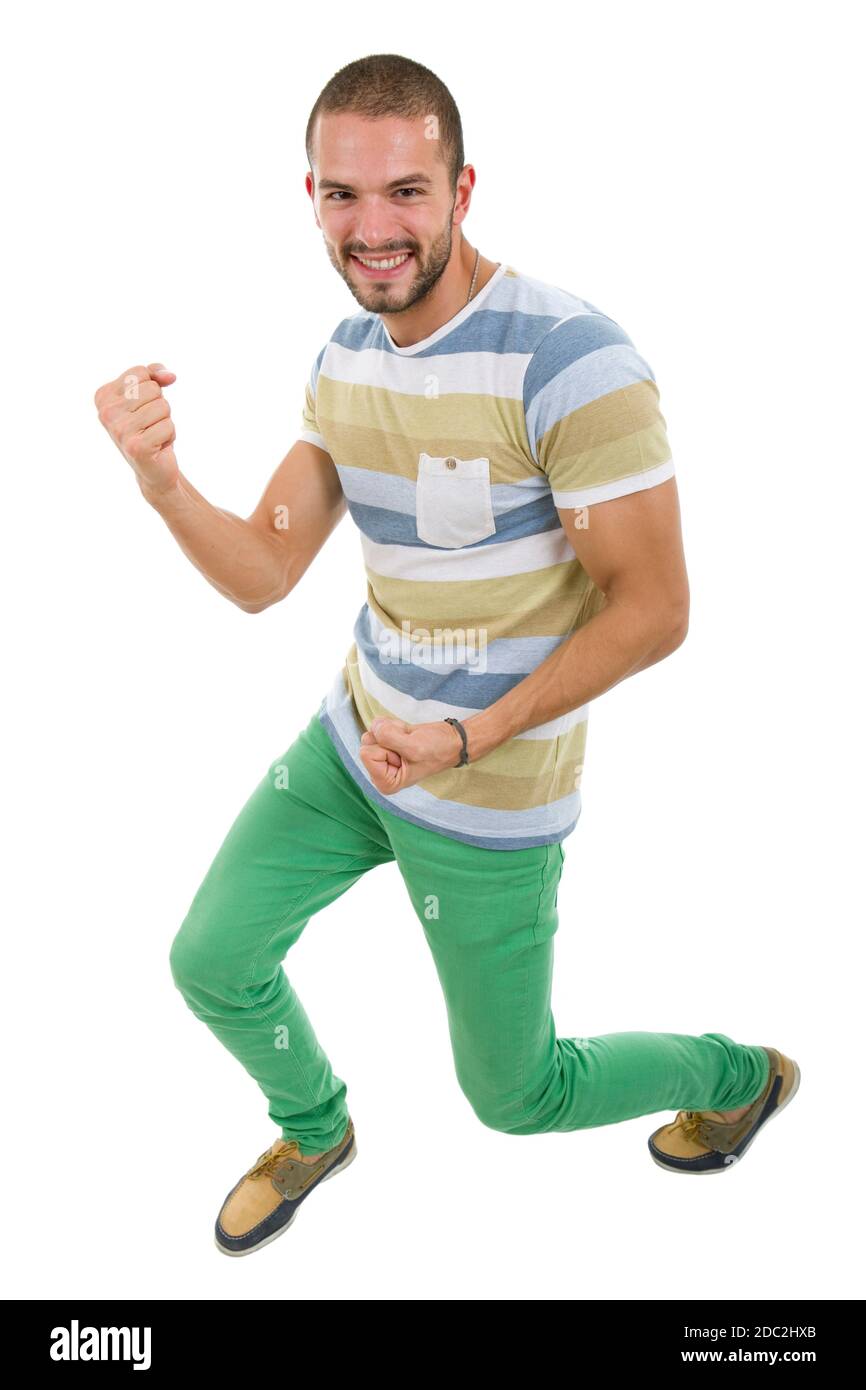 happy young man winning, full length, isolated Stock Photo - Alamy