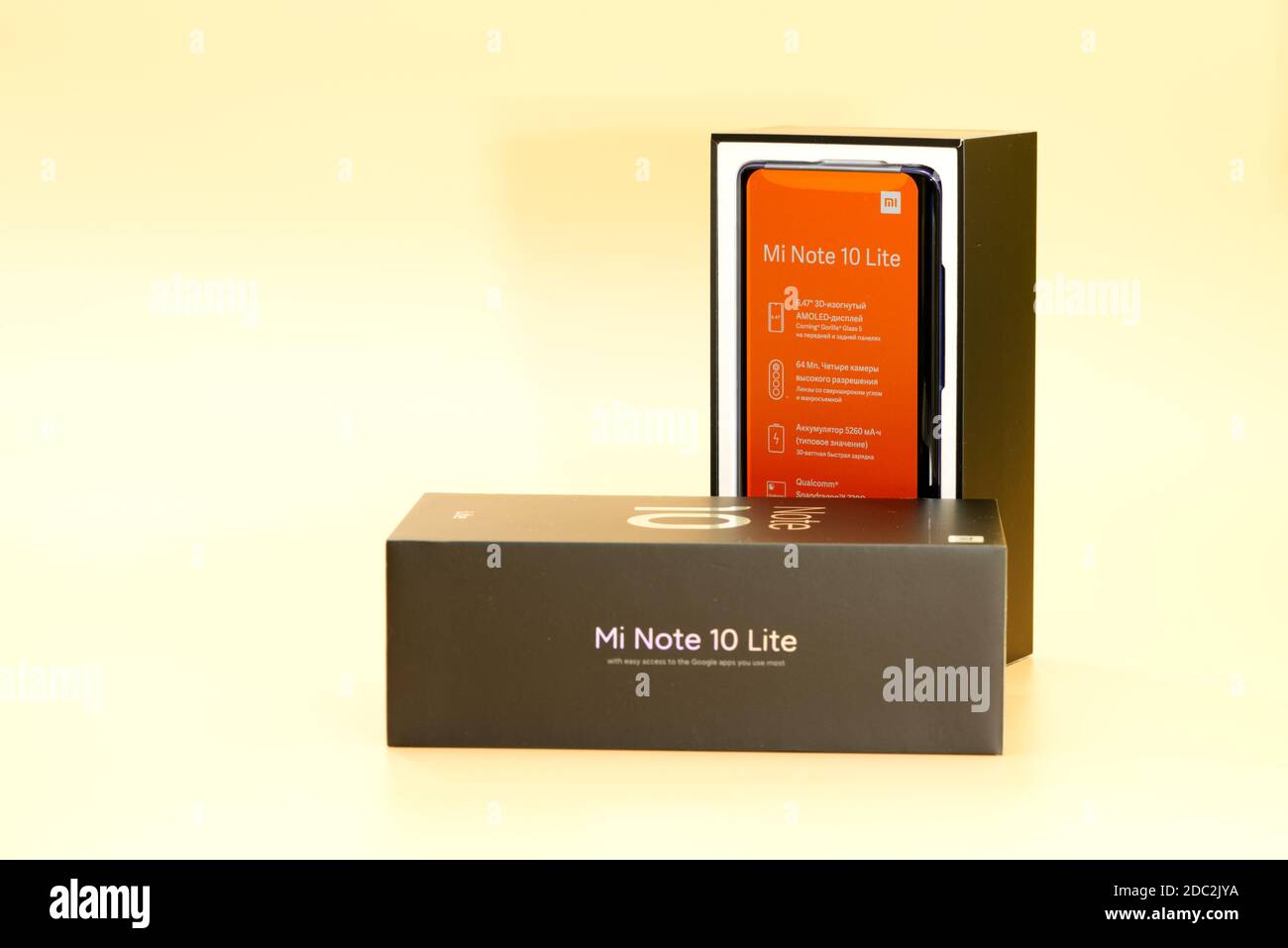 Xiaomi mi note 10 lite new phone box, black on peach colored background ...