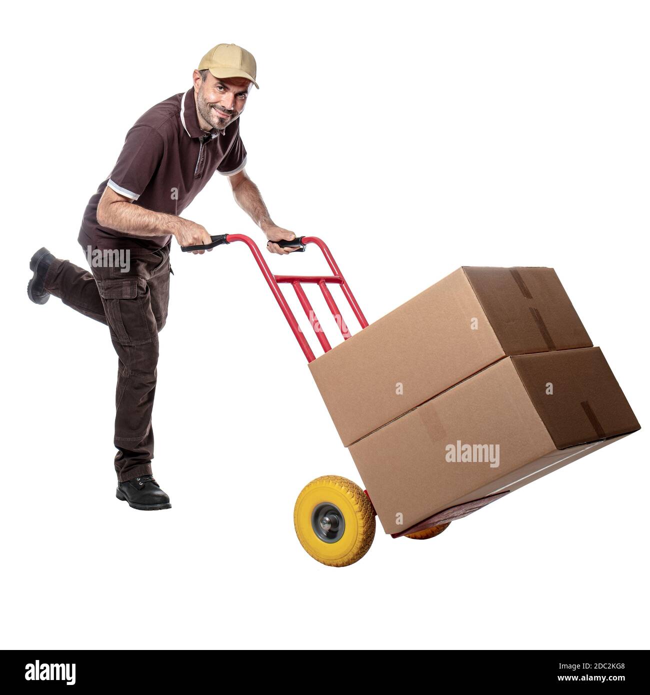 delivery man con handtruck isolated on white background Stock Photo - Alamy