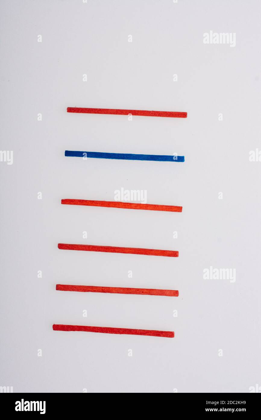 Sticks of various colors on awhite background Stock Photo - Alamy