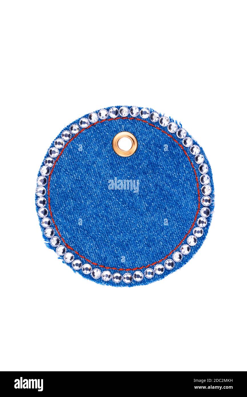 Round price tag encrusted with crystals made of denim, isolated on a ...