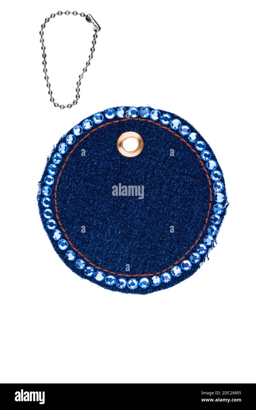 Round price tag encrusted with crystals made of denim, isolated on a ...