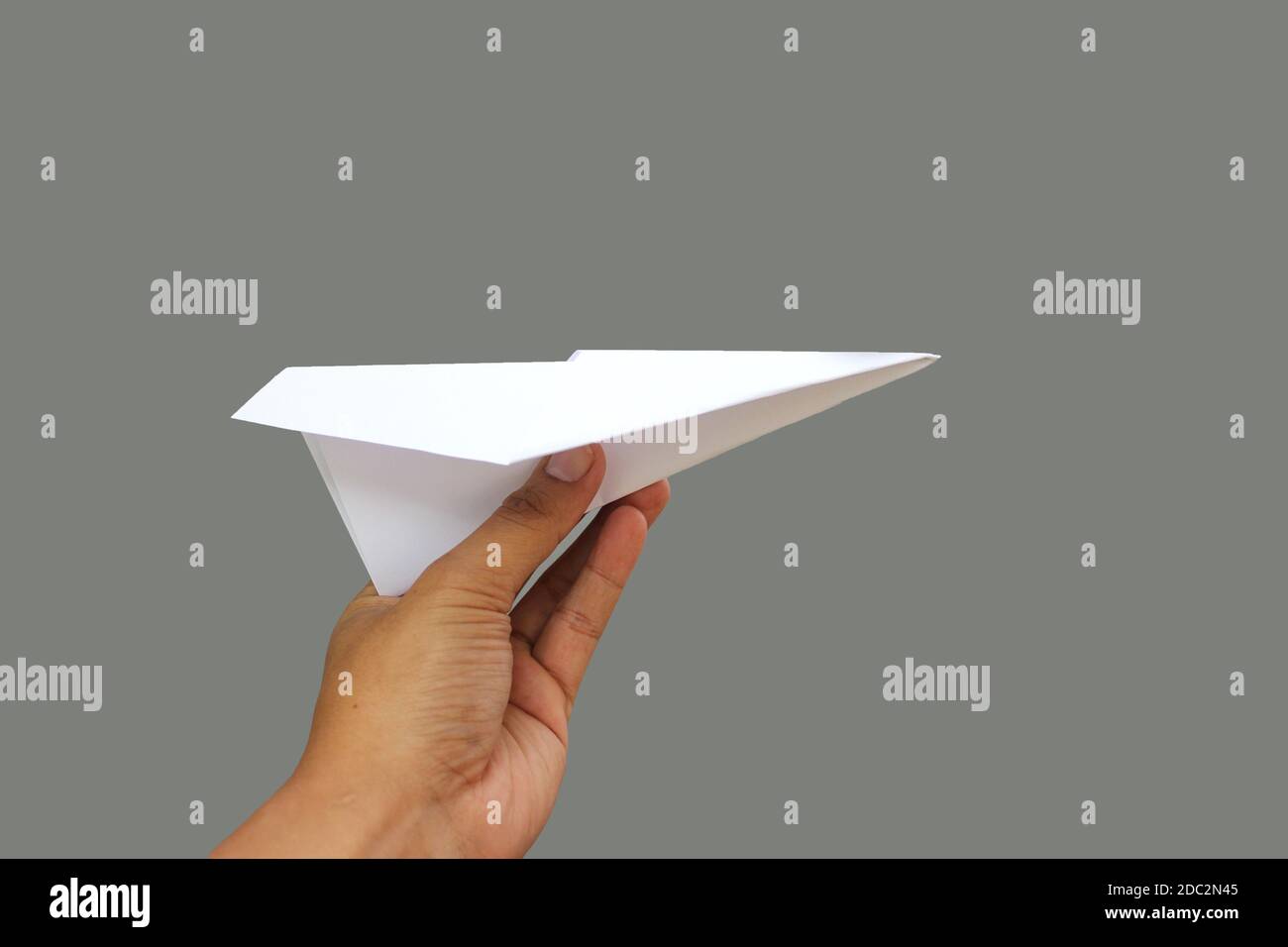 paper plane in a hand Stock Photo - Alamy