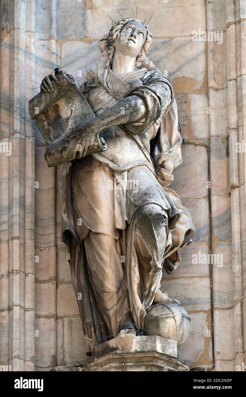 Statue of Saint on the facade of the Milan Cathedral, Duomo di Santa ...