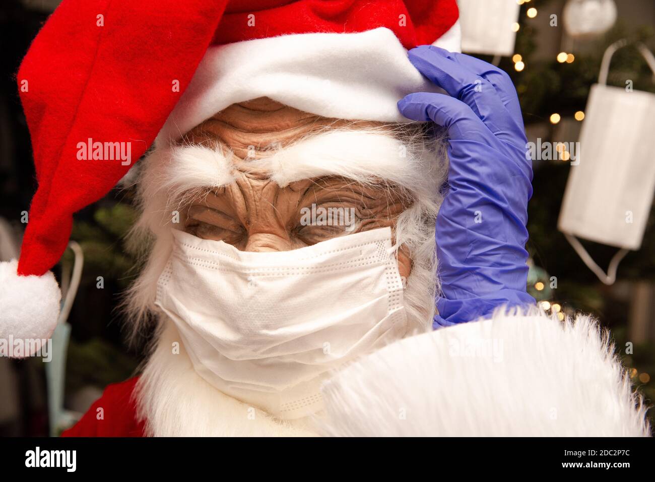 Santa Claus wearing a Face Mask and protective safety gloves for Covid ...