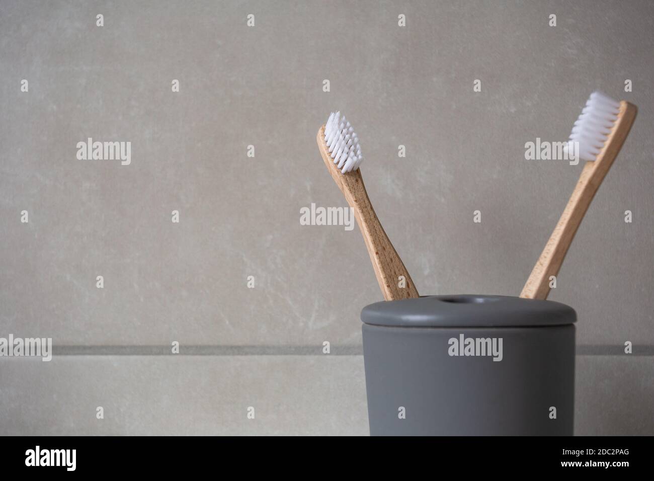 Eco Friendly bamboo natural organic toothbrushes in grey holder, with ...