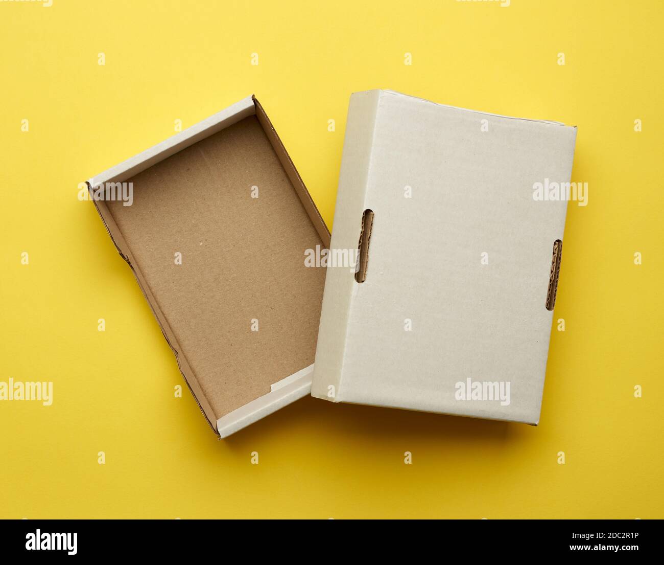 open empty rectangular box on yellow background, top view Stock Photo ...