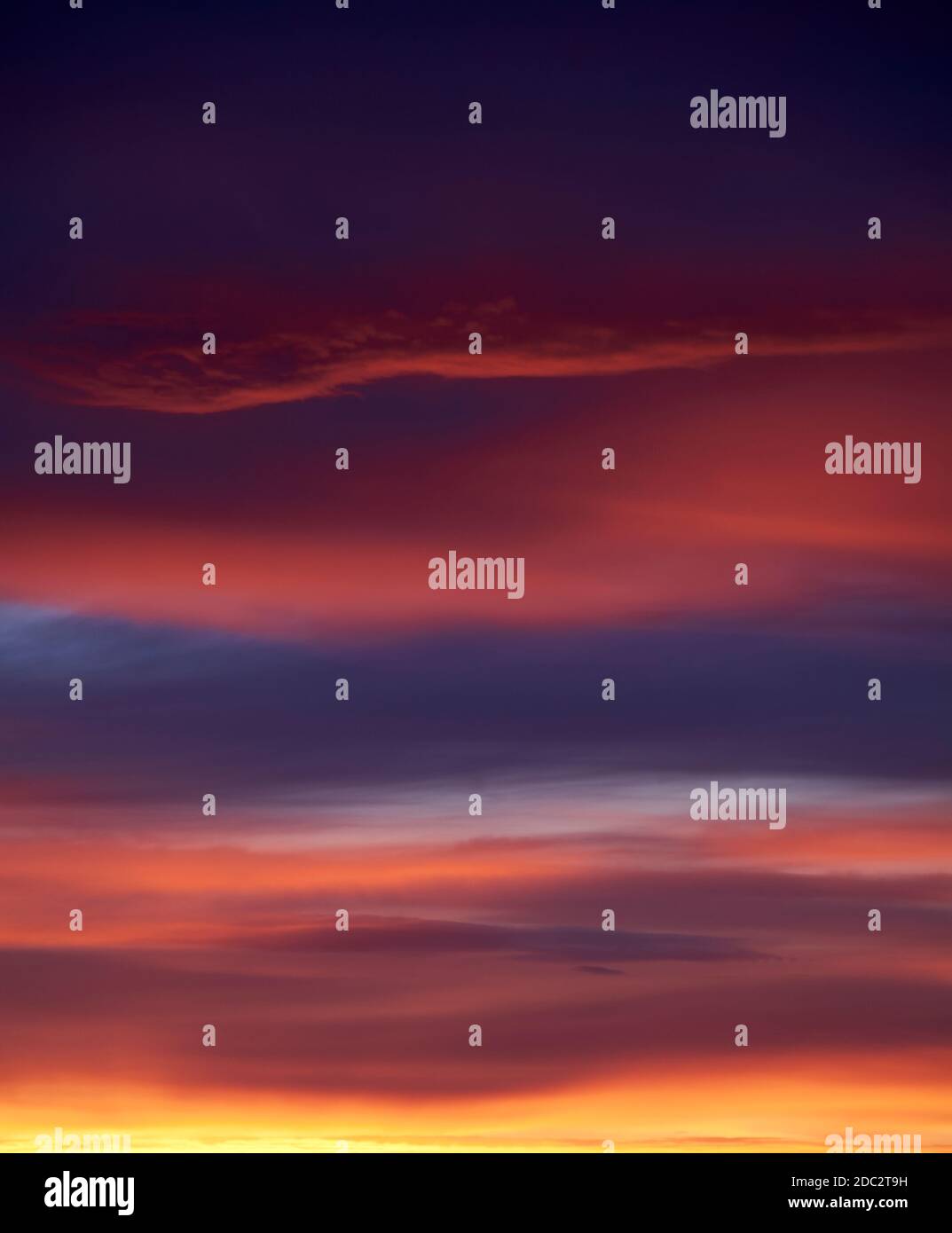 Sunset. Heaven, orange sky. Sun rays. Wallpaper. Clouds Stock Photo - Alamy