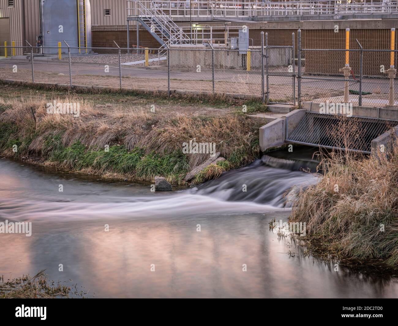 Processed and cleaned sewage flowing out from water reclamation ...