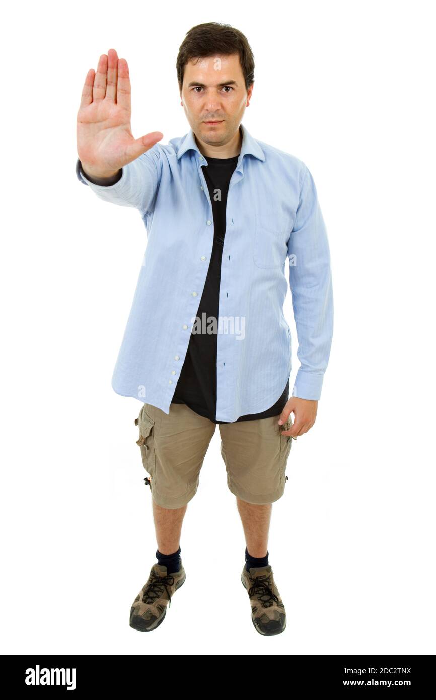 young casual man going stop with his hand, in a white background Stock ...
