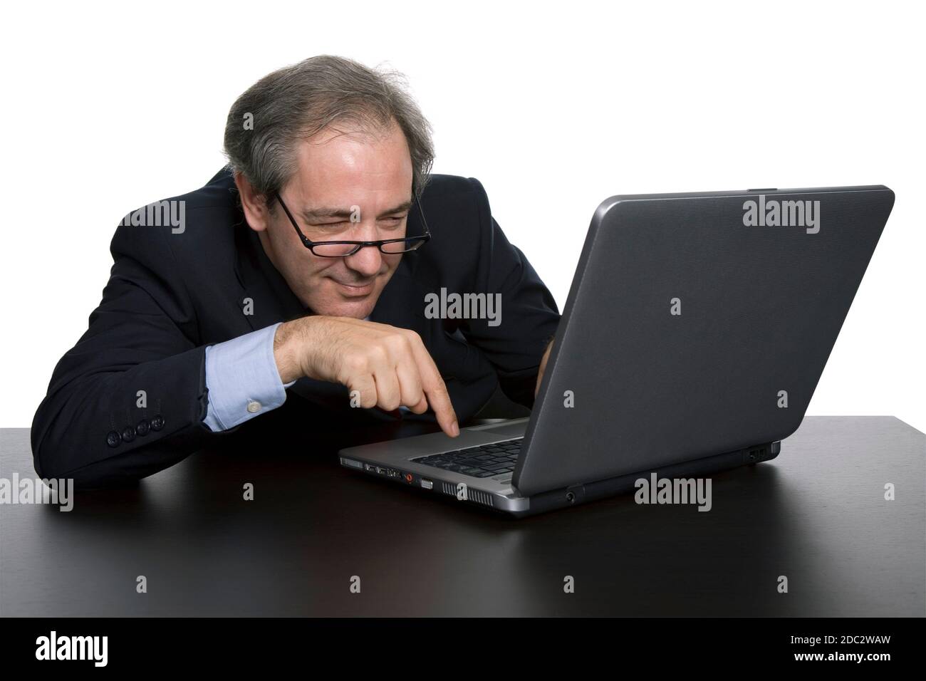 mature business man working with his laptop Stock Photo - Alamy