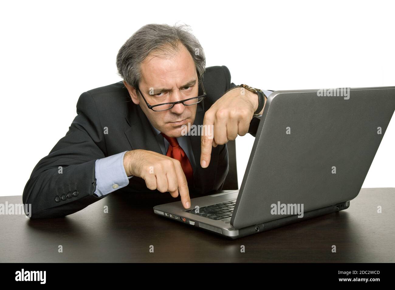 mature business man working with his laptop Stock Photo - Alamy