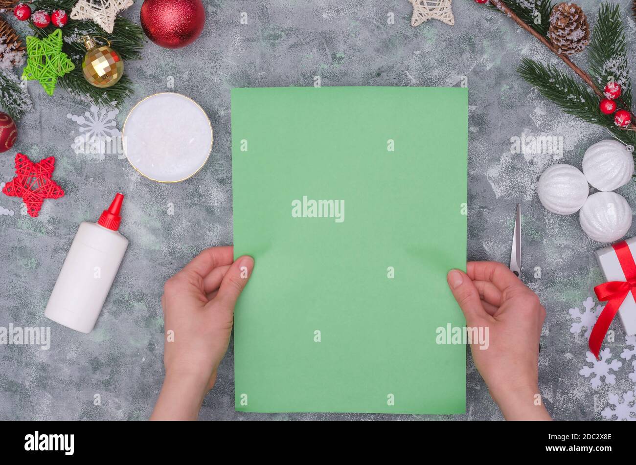 Christmas craft - paper tree, step by step instructions. Step 2- take a ...