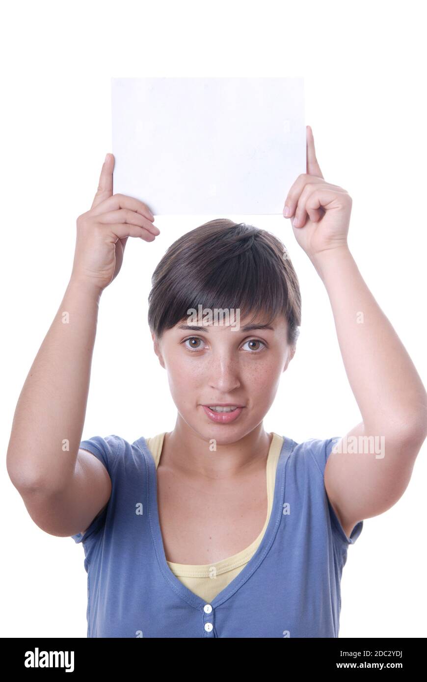 Young girl holding a card in the top of the head Stock Photo - Alamy