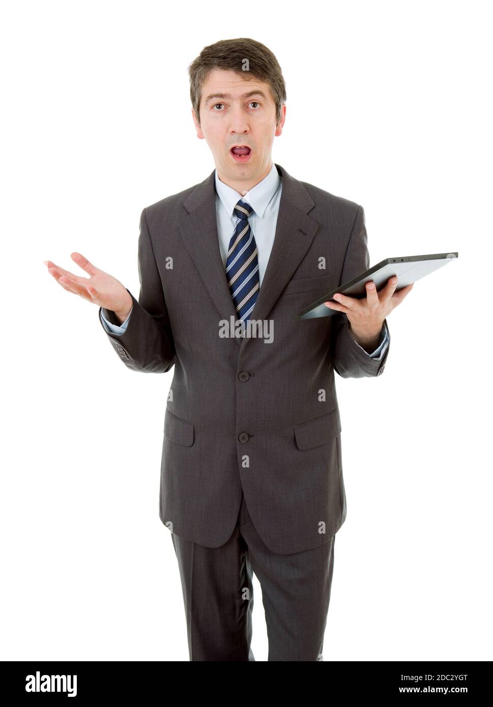 businessman surprised and waiting with a tablet pc, isolated Stock ...