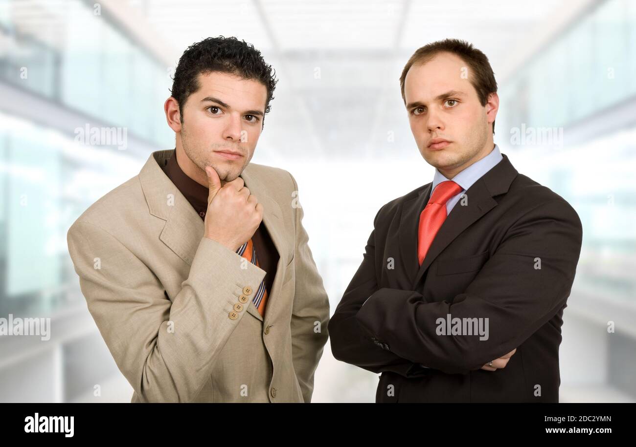 two young business men portrait at the office Stock Photo - Alamy