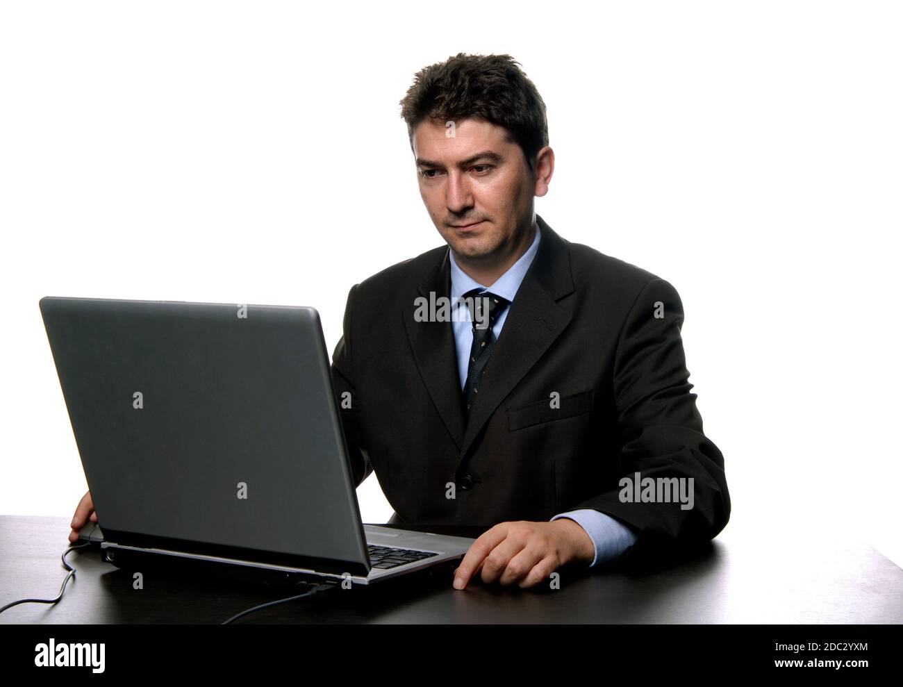 young man working with his personal computer Stock Photo - Alamy