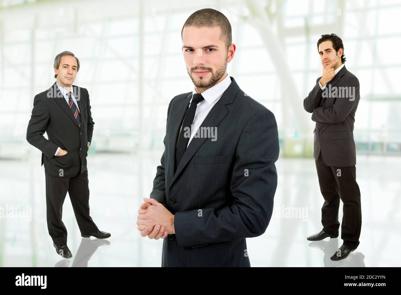 three business men portrait at the office Stock Photo - Alamy