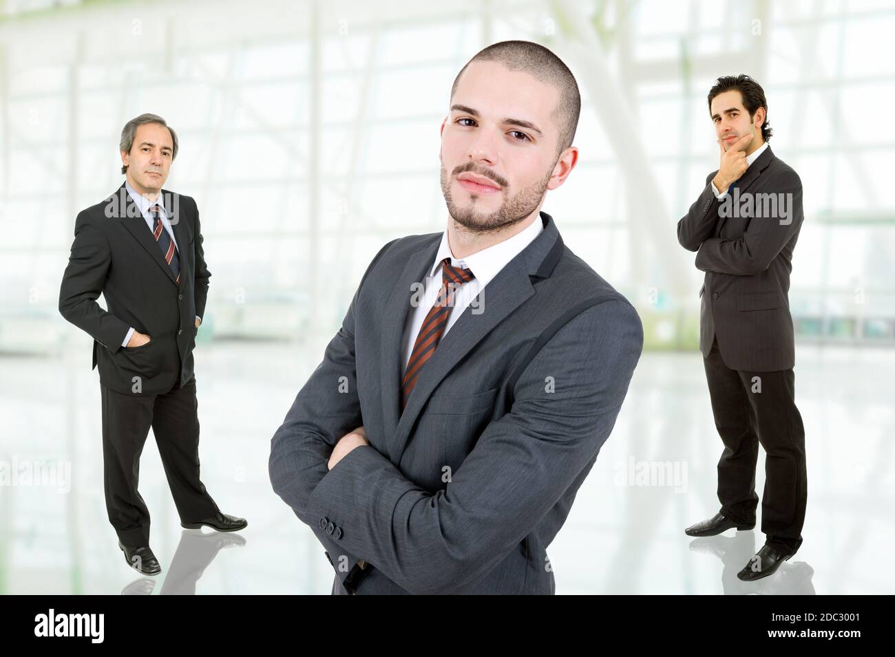 three business men portrait at the office Stock Photo - Alamy