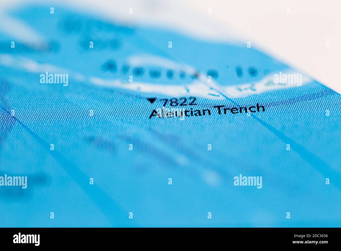 Shallow depth of field focus on geographical map location of Aleutian ...