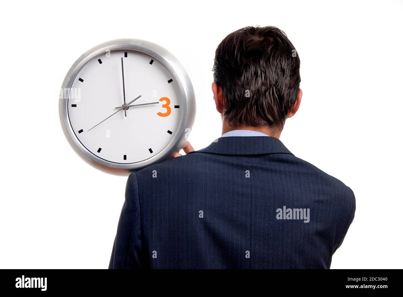 business man wearing suit holding clock detail Stock Photo - Alamy