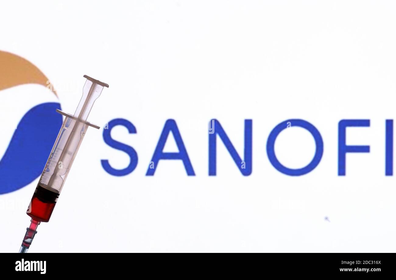 In this photoillustratn medical syringe is seen with Sanofi company ...