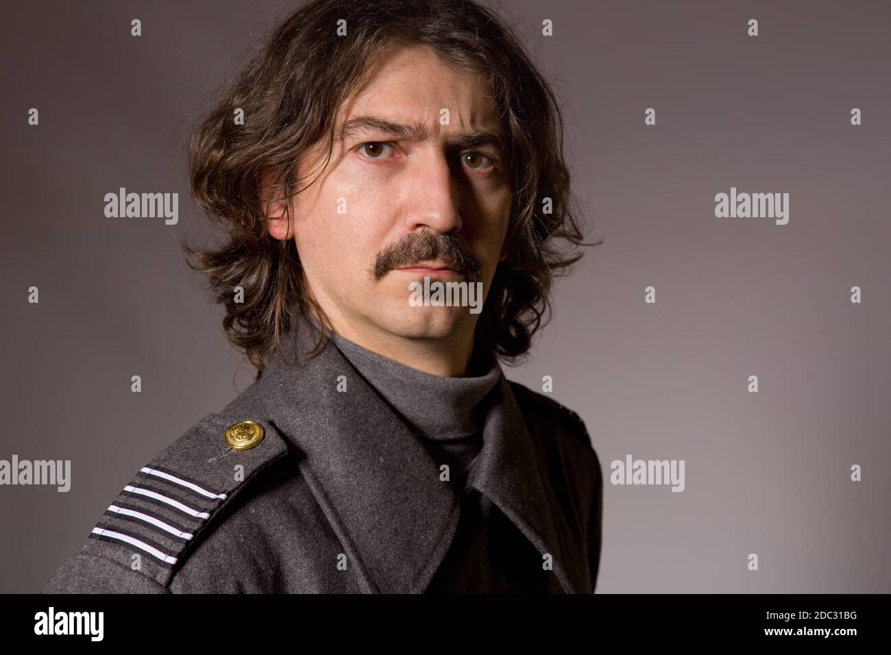 young man dressed as russian military, studio picture Stock Photo - Alamy