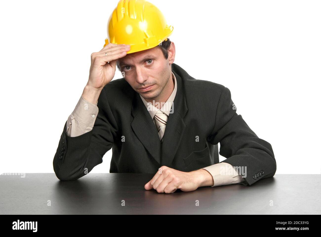 An engineer yellow hat, isolated on white Stock Photo - Alamy