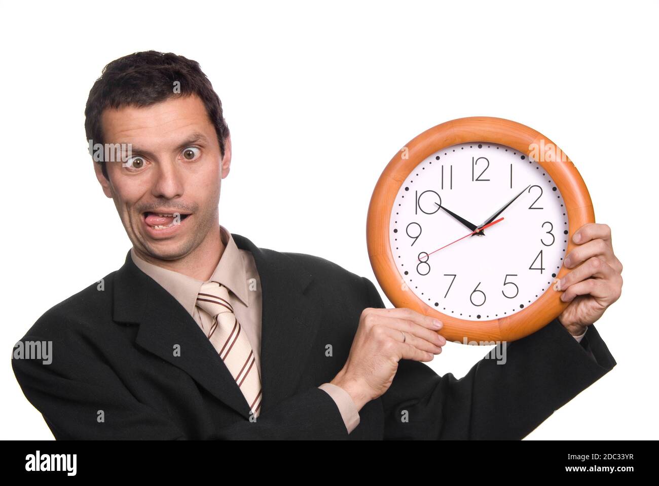 silly business man portrait with a clock Stock Photo - Alamy