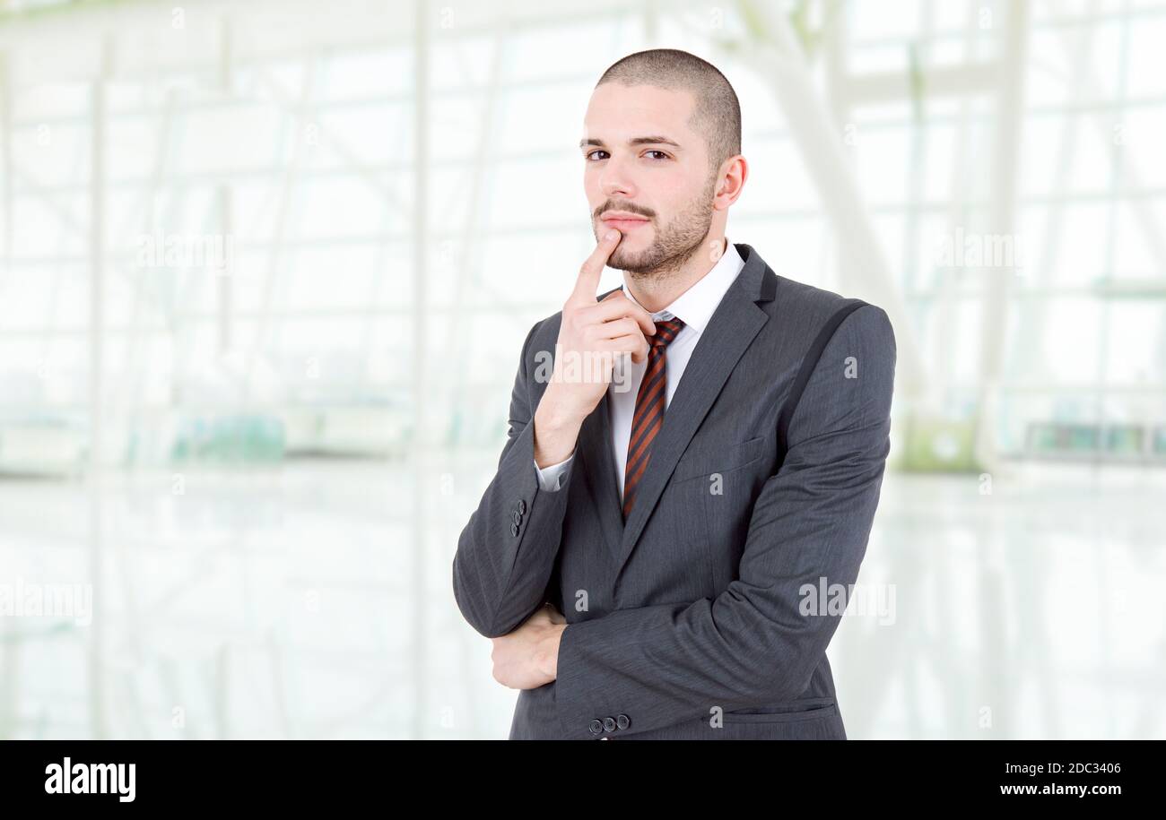 young business man thinking at the office Stock Photo - Alamy