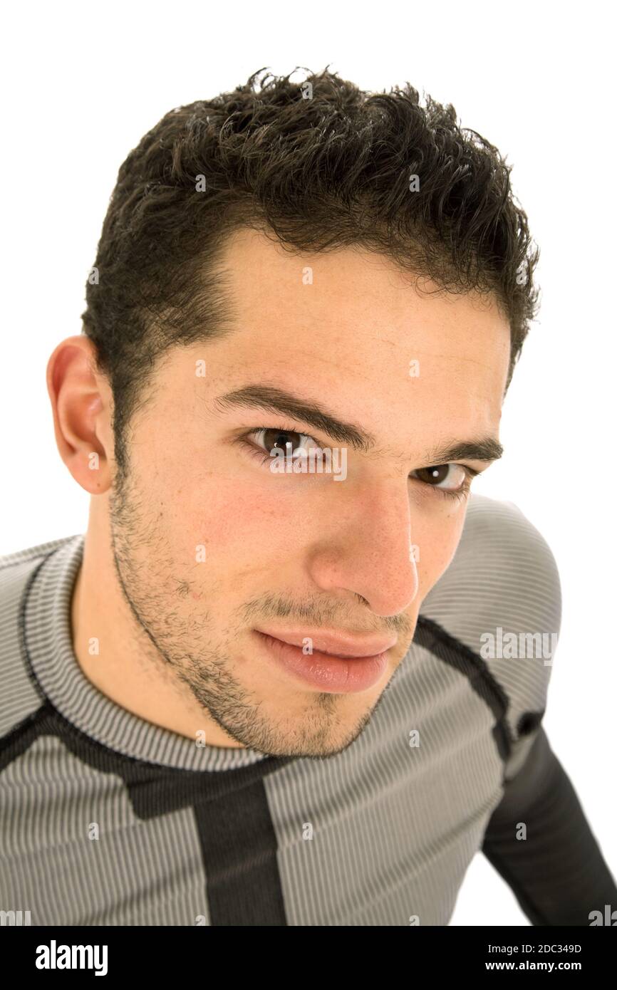 young silly man portrait in a white background Stock Photo - Alamy