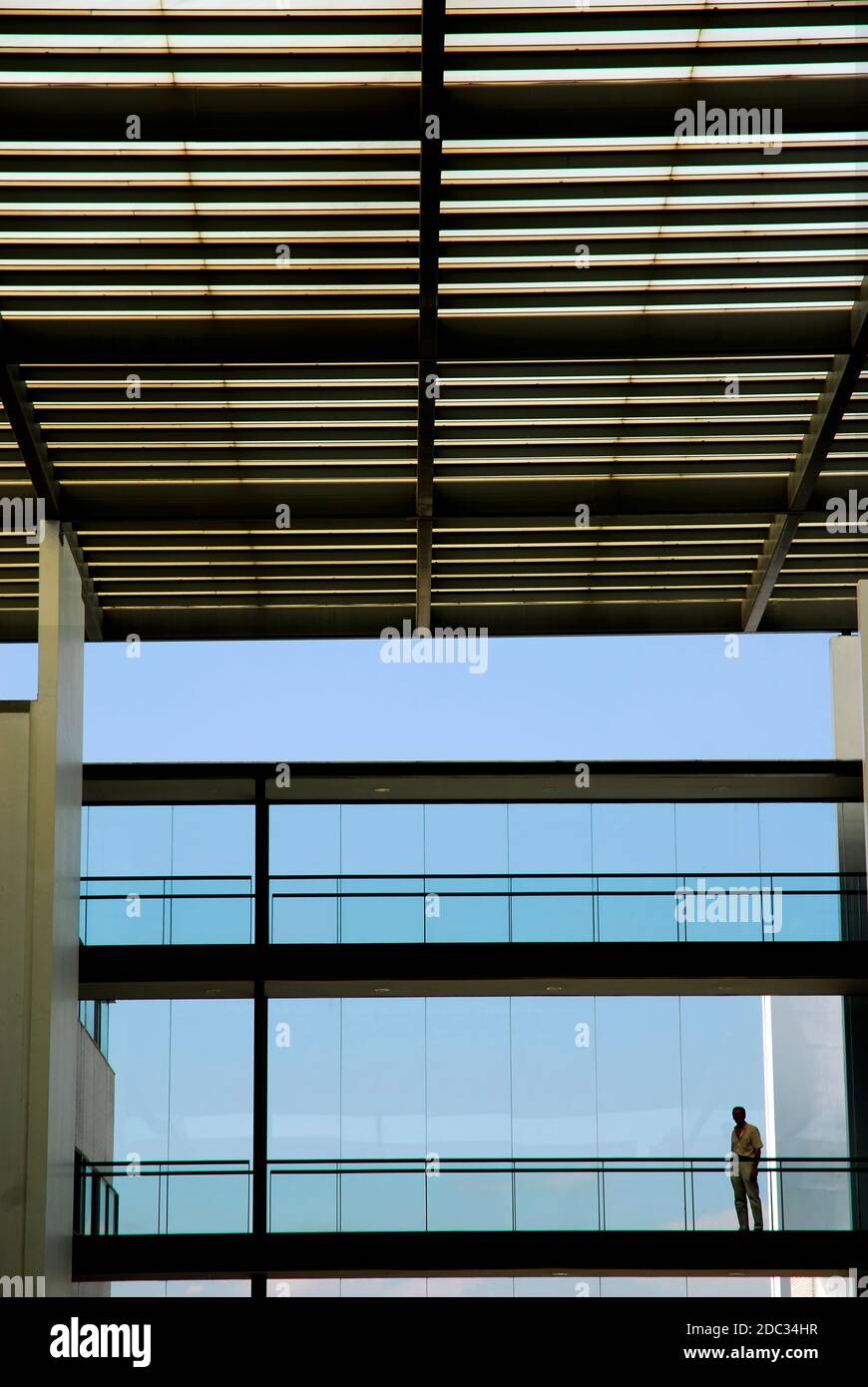 man inside the modern building in silhouette Stock Photo - Alamy