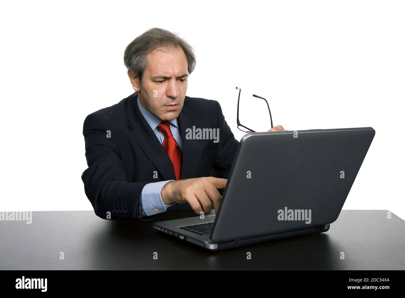 mature business man working with his laptop Stock Photo - Alamy