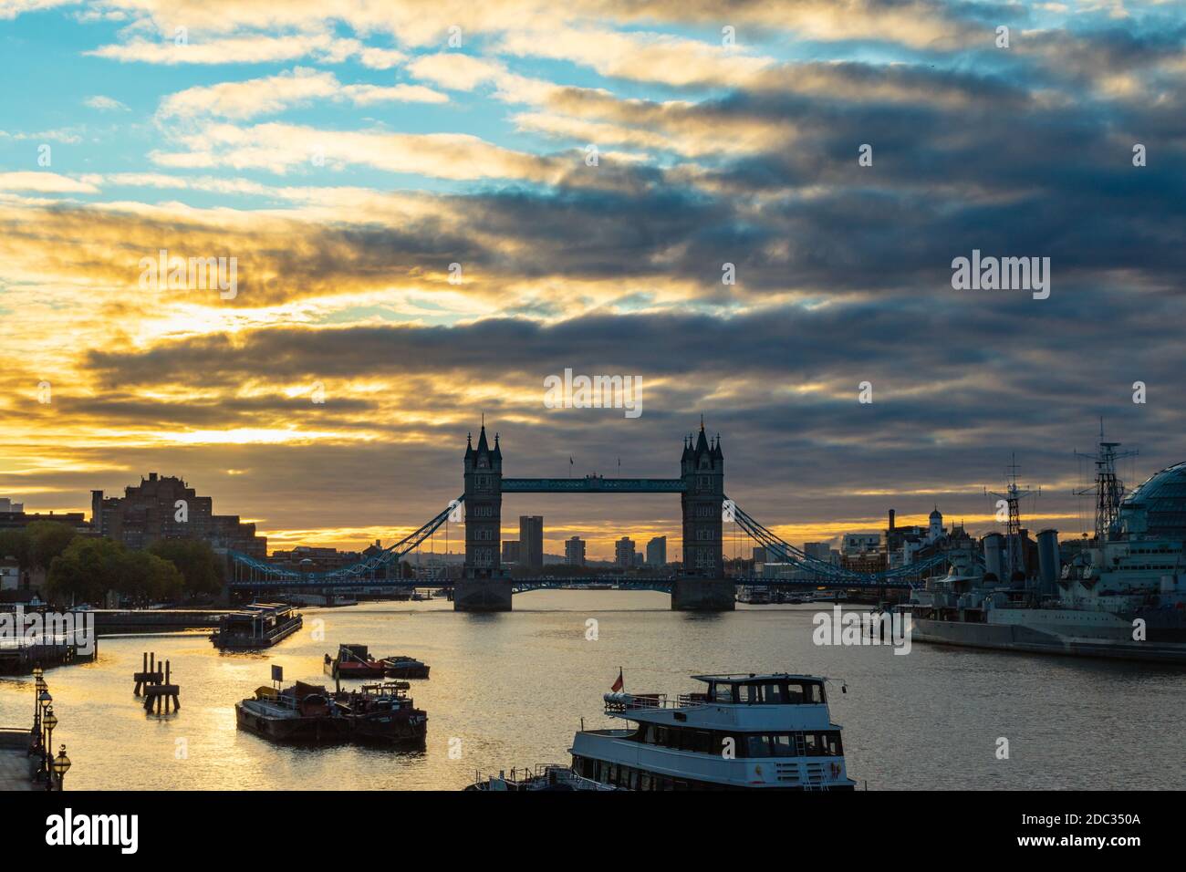 Tower Bridge against an early morning sky with rising sunlight Stock ...
