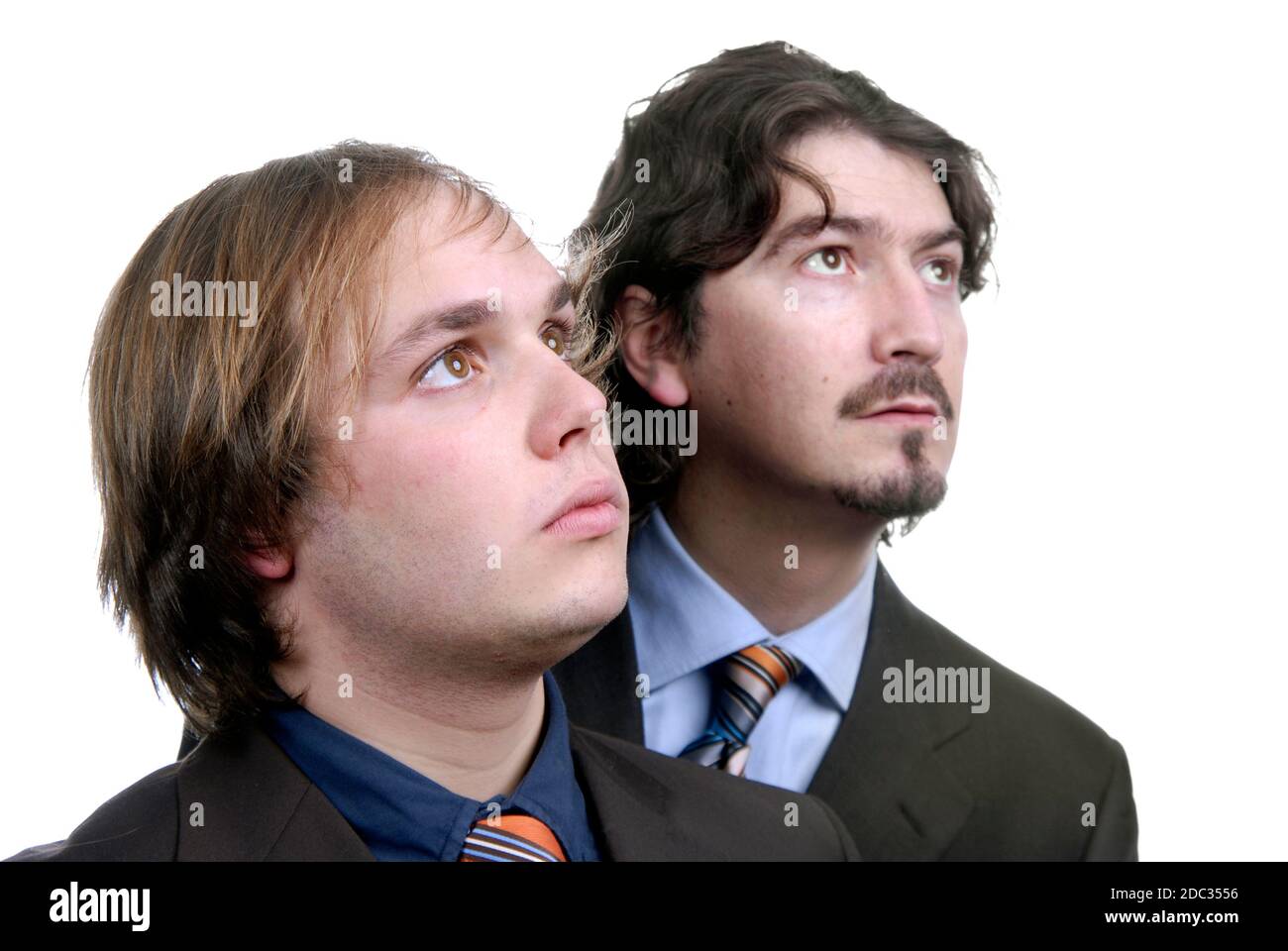 two young business men portrait on white. focus on the left man Stock ...