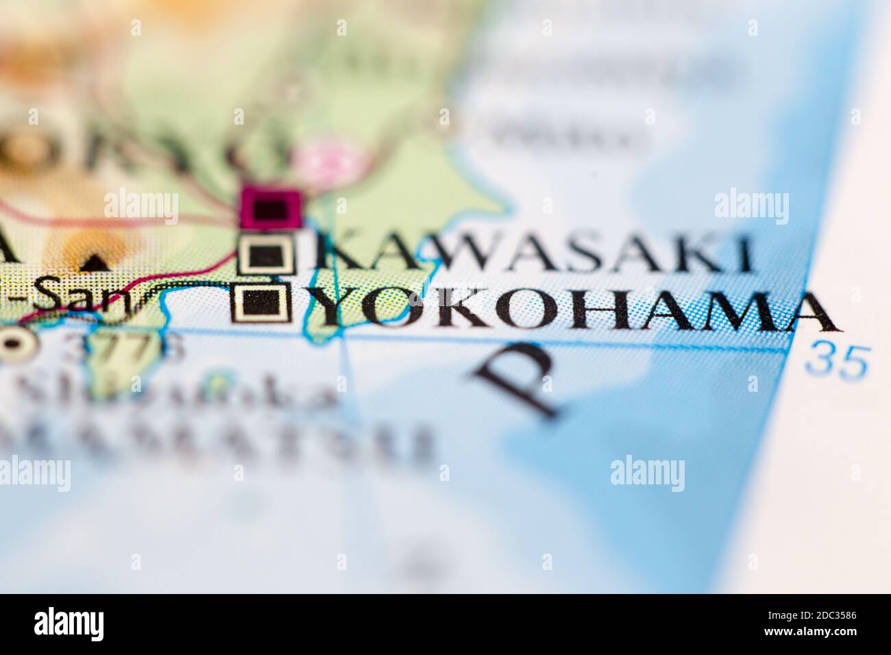 Shallow depth of field focus on geographical map location of Yokohama ...